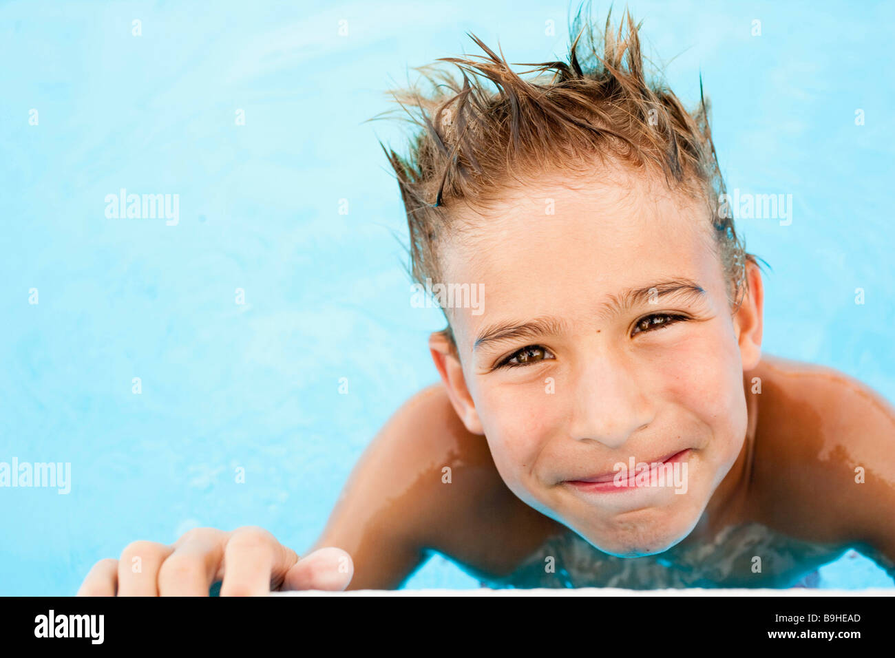 Boy smiling into camera Stock Photo - Alamy