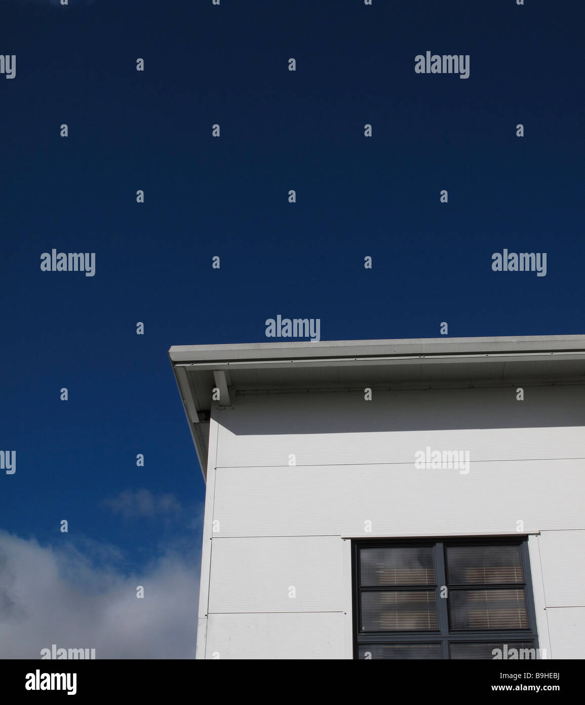 Wall and eaves detail on modern industrial building Stock Photo - Alamy
