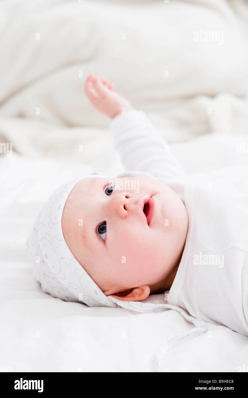 Baby looking up Stock Photo - Alamy