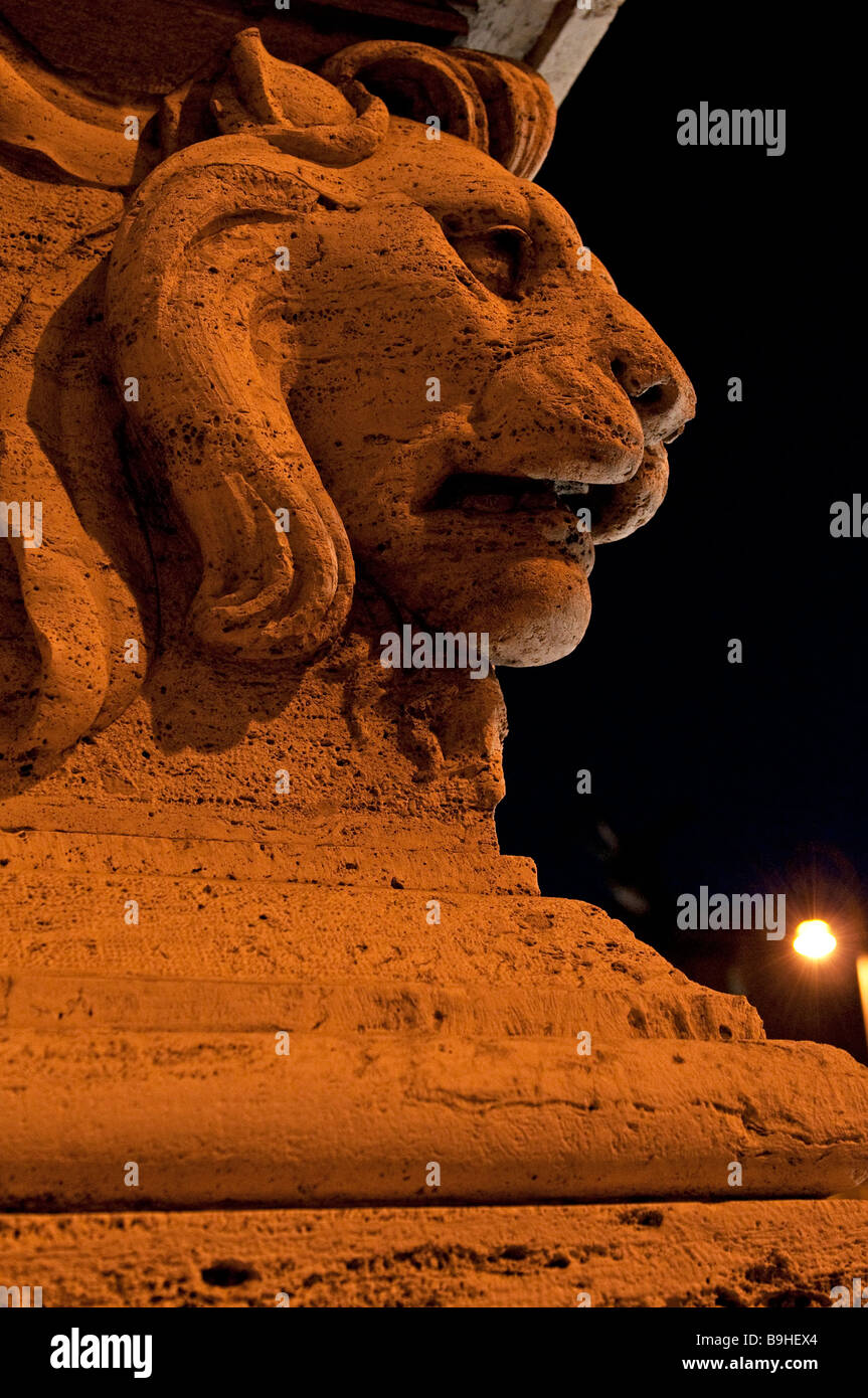 Lion head in Rome by night Stock Photo - Alamy