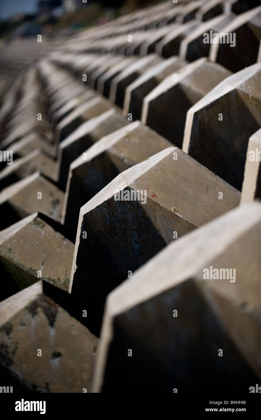 Concrete sea defence blocks Stock Photo - Alamy