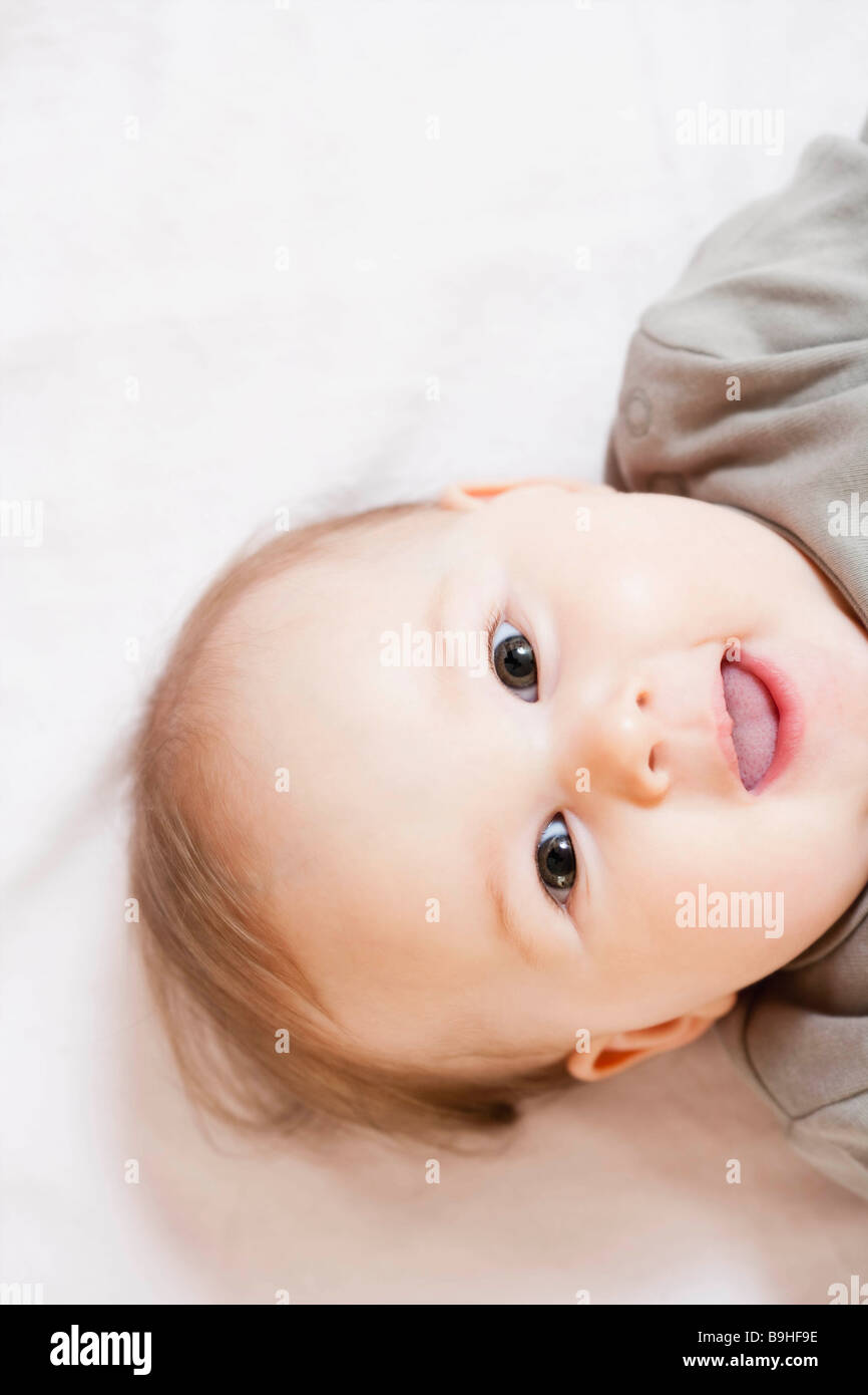 Baby smiling to camera Stock Photo - Alamy