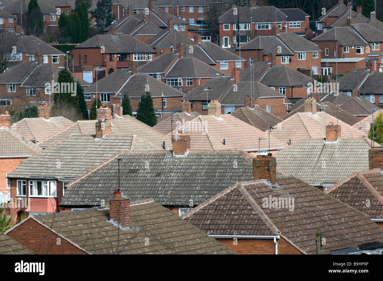 A view of suburban houses and rooftops in the West Midlands England UK ...