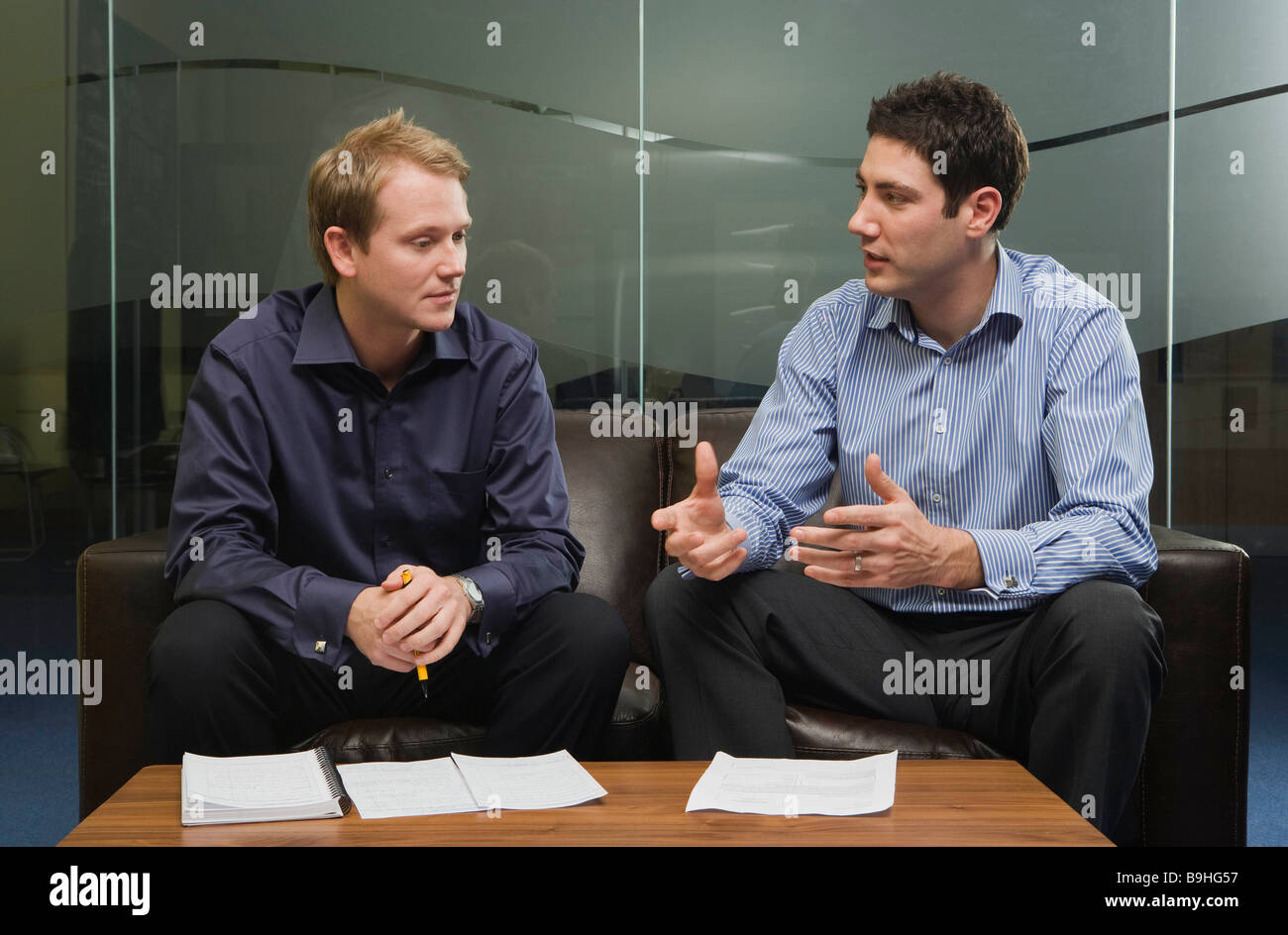 Two men having discussion Stock Photo - Alamy