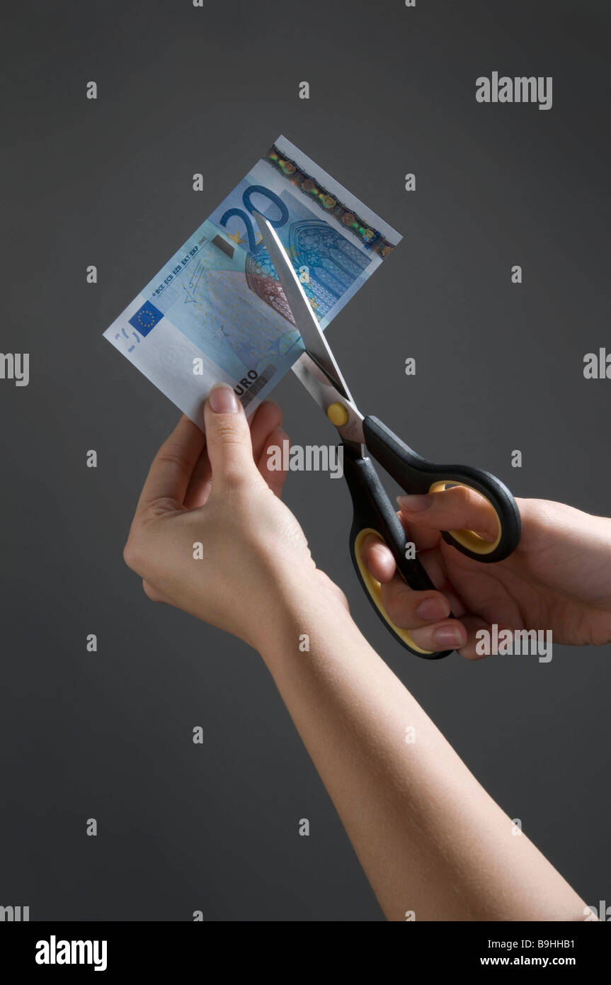 Hands cutting letter scissors hi-res stock photography and images - Alamy