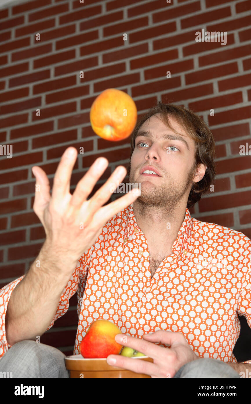 Chairs man young throws up seriously apple semi-portrait people 20-30 ...