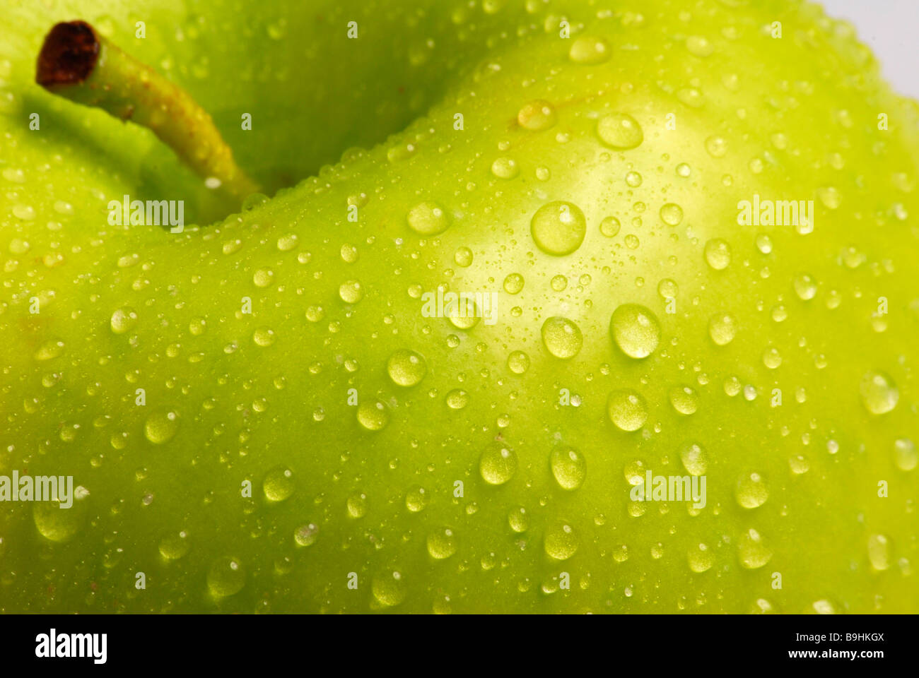 Apple with waterdrops Stock Photo - Alamy