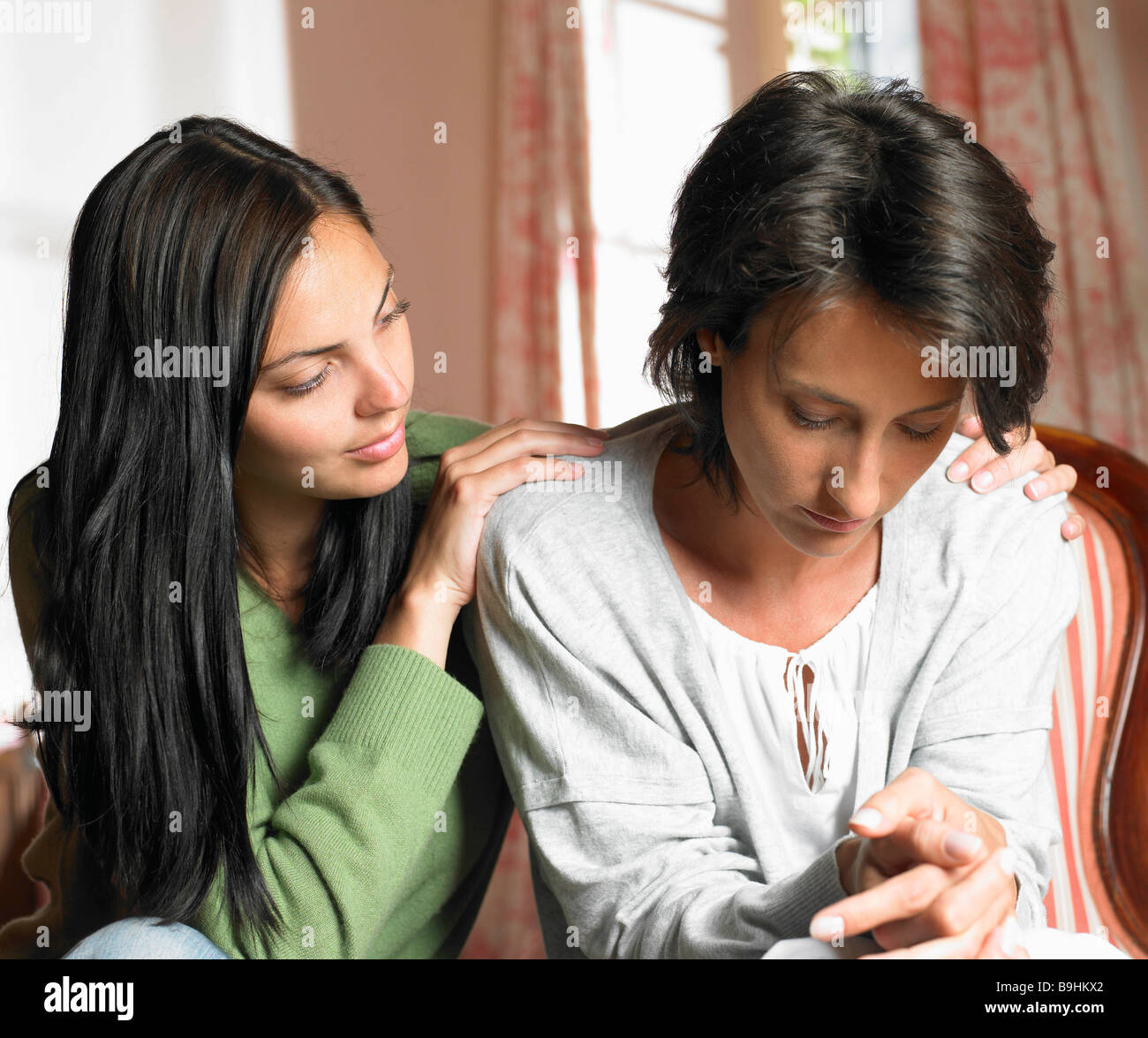 Woman supporting her friend Stock Photo - Alamy