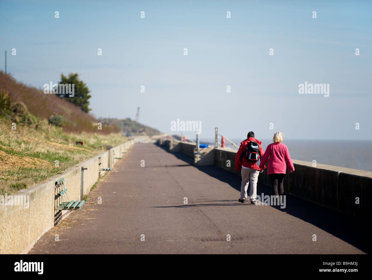 Friends walking along promenade hi-res stock photography and images - Alamy