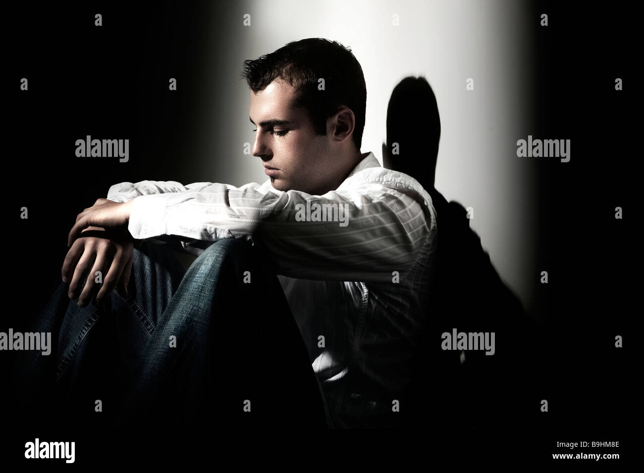 Lonely young adolescent contemplating hi-res stock photography and ...