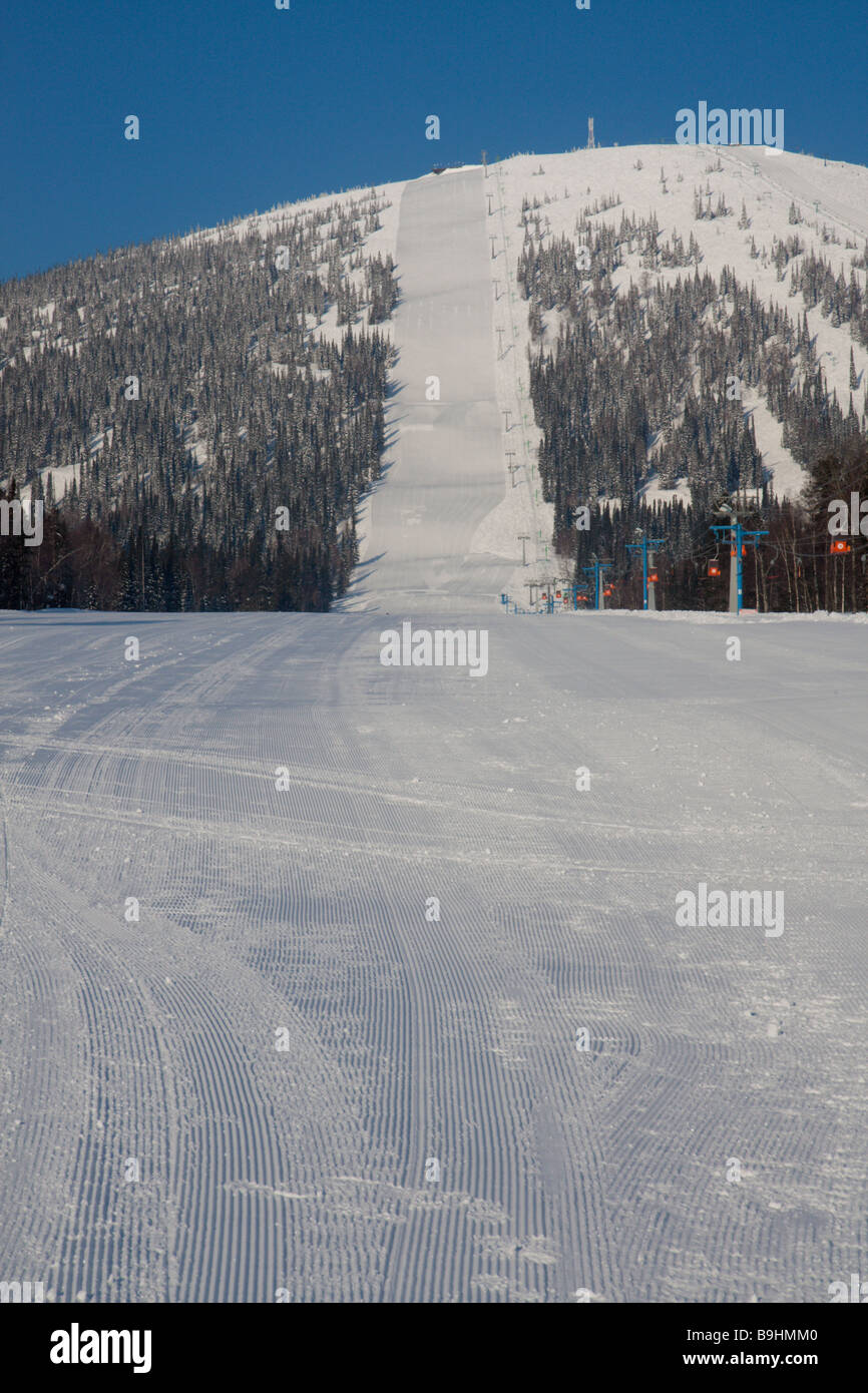 Long slope for skiing and snowboarding with elevator Stock Photo - Alamy