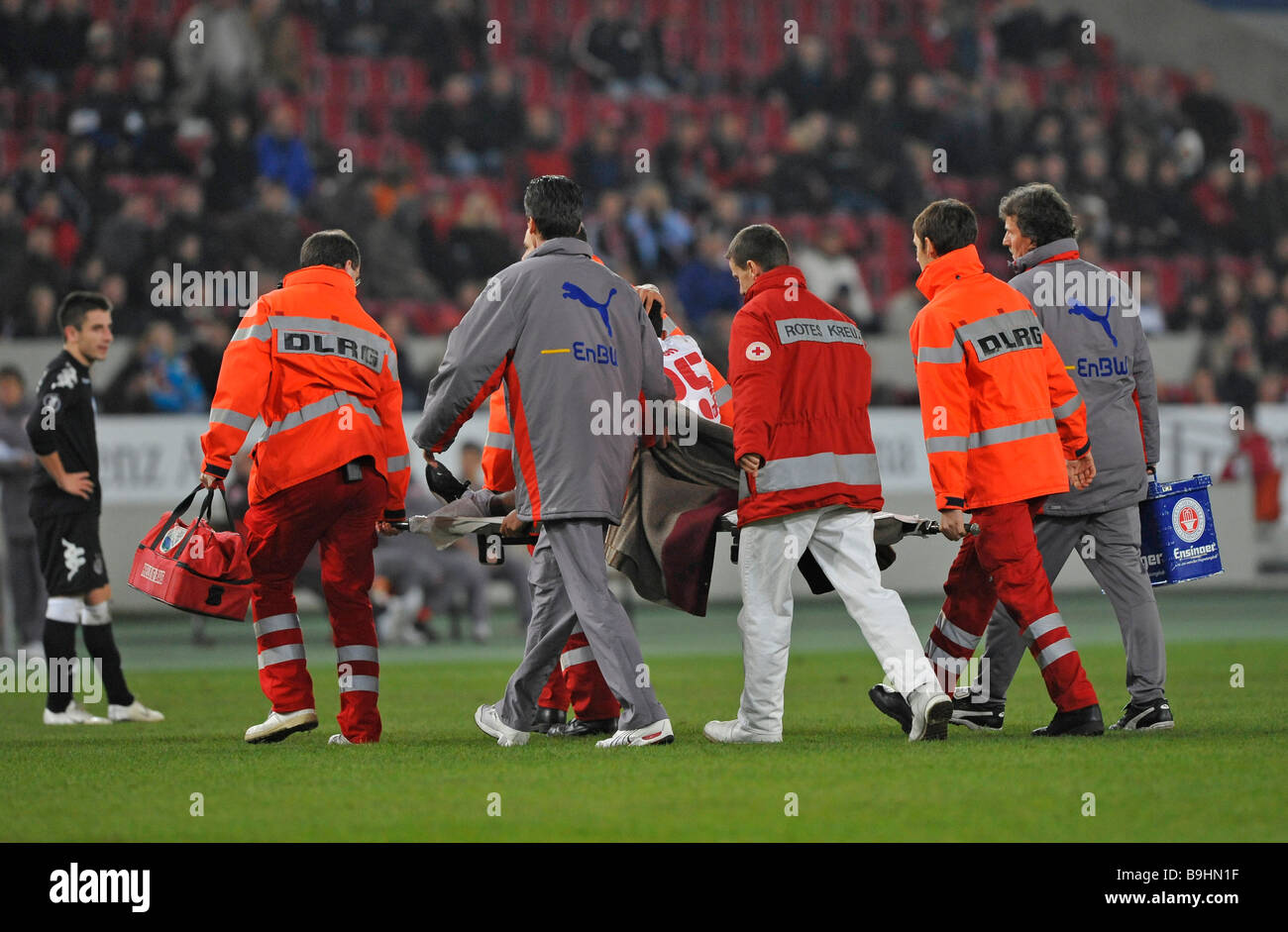 Hurt Elson VfB Stuttgart being carried off the football field by medics ...