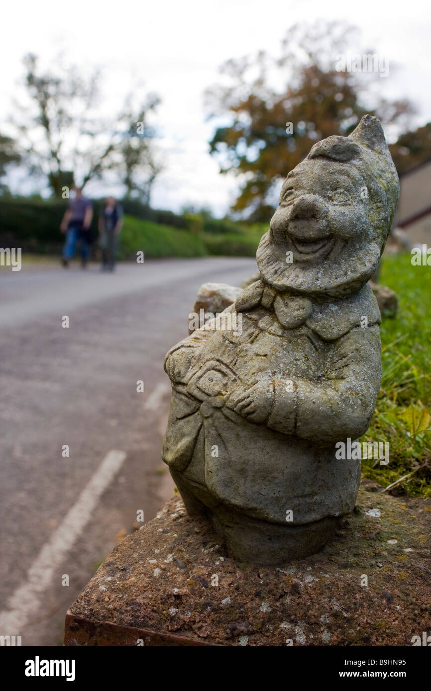 Garden stone gnome Stock Photo - Alamy