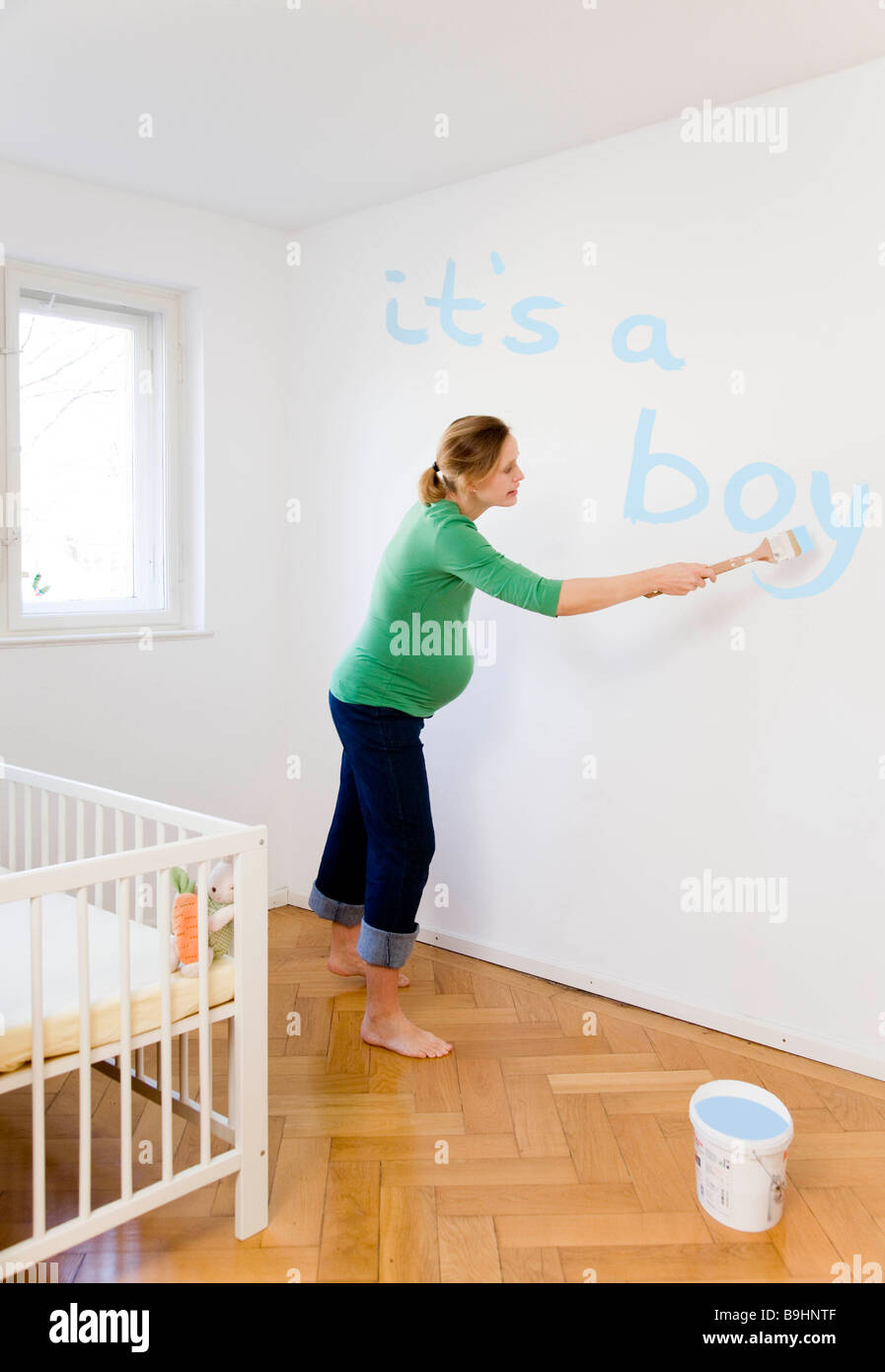 Pregnant Woman Painting Nursery Stock Photo Alamy pregnant-woman-painting-nursery-stock-photo-alamy