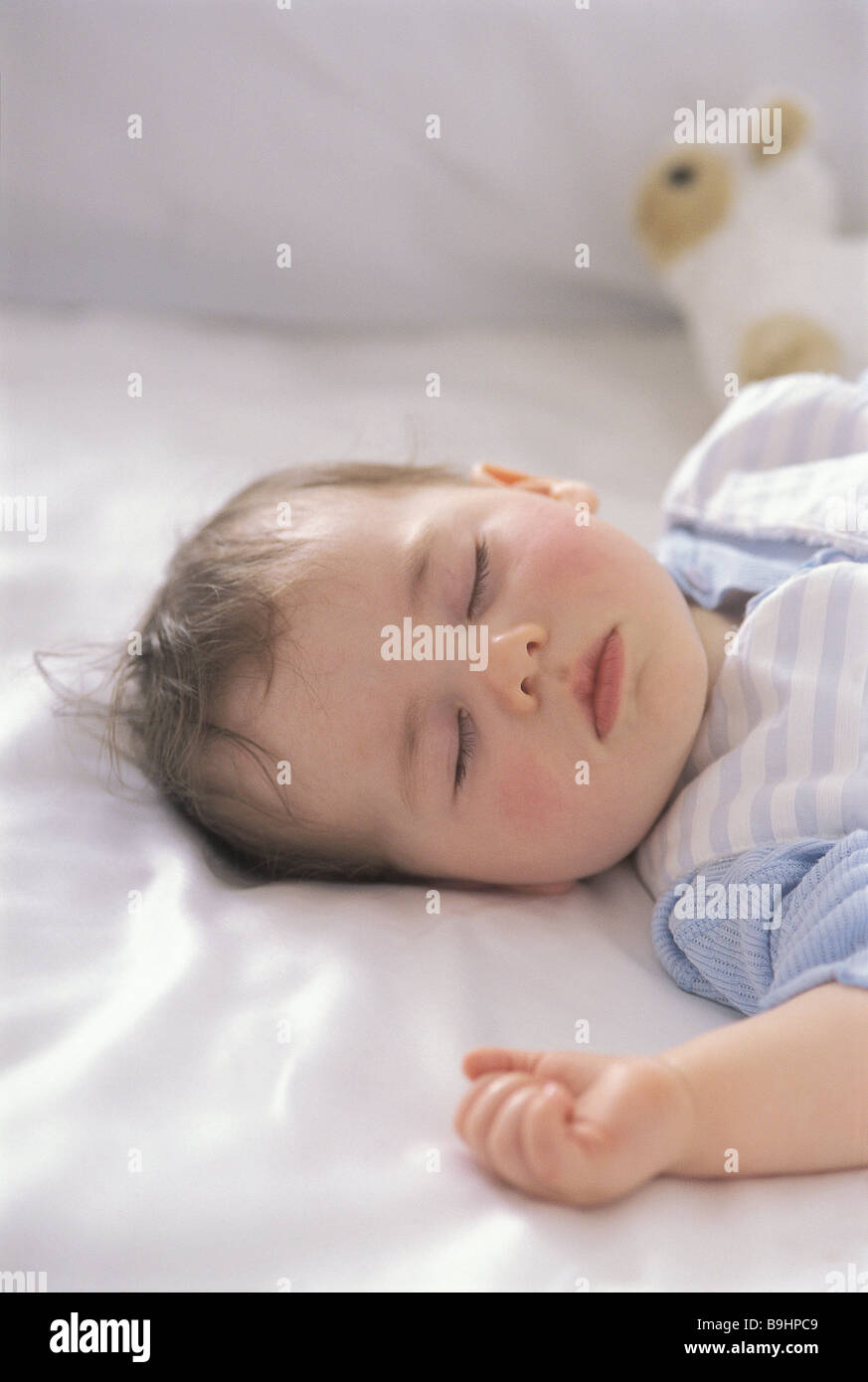 Sleeps bed baby portrait people child small infant face supine position ...
