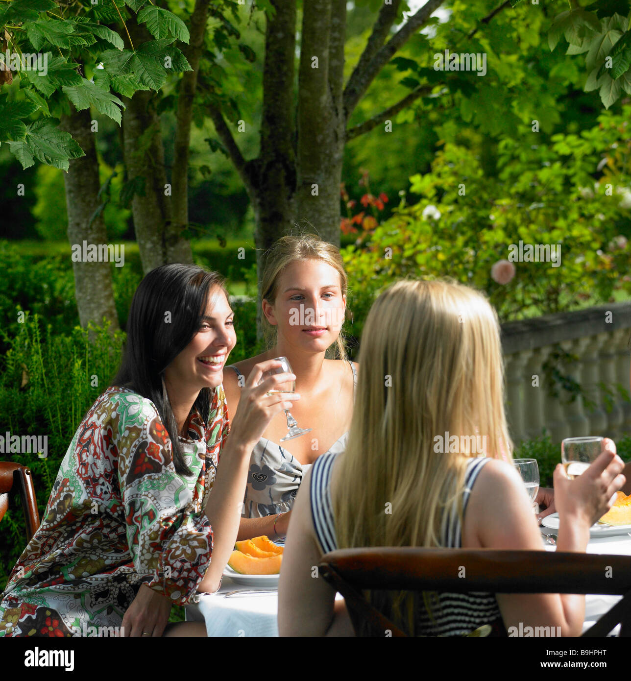 Woman white wine drink outside france hi-res stock photography and ...