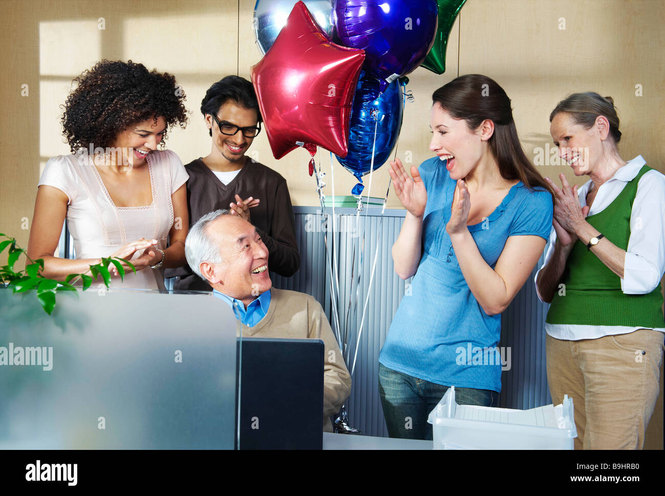 Group of office workers celebrating Stock Photo - Alamy