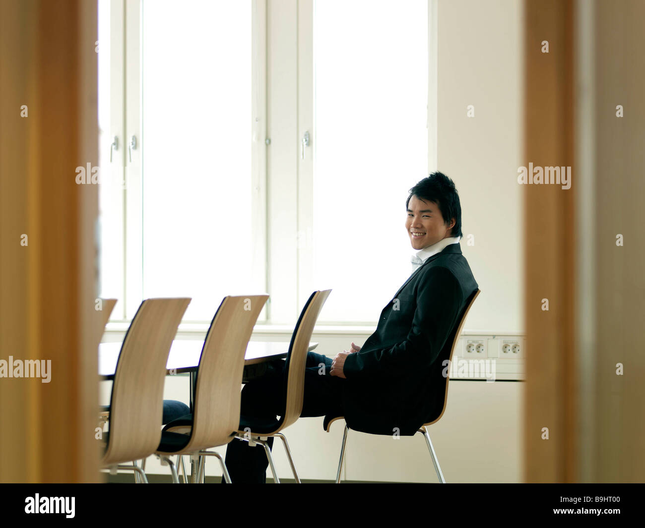 Mixed race businessman table hi-res stock photography and images - Alamy