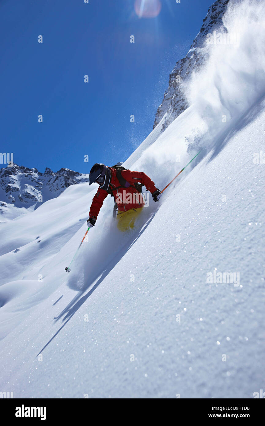 Extreme skier on mountainside Stock Photo - Alamy