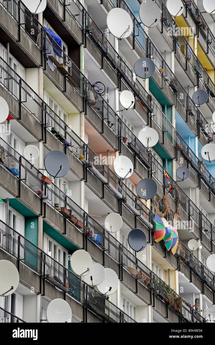 Satellite dishes on a seventies tenement building, Berlin, Germany ...
