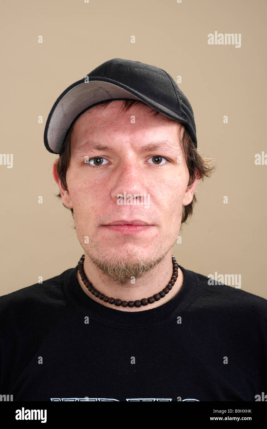 Striking portrait of a young musician wearing a cap Stock Photo - Alamy