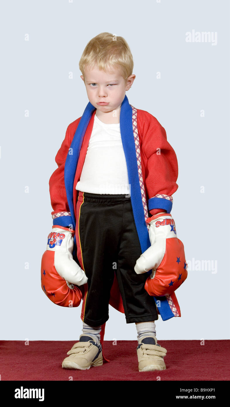 boy facial expression blue eye boxing gloves stands people child ...