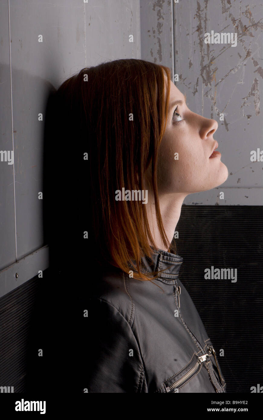 Woman young elevator lean high-sees portrait sidewards people young ...