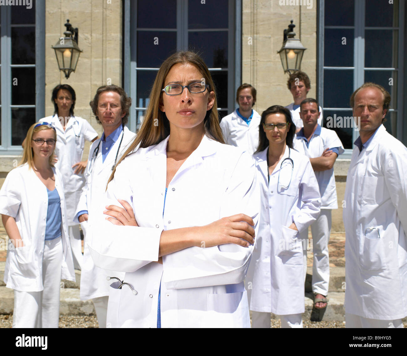 Doctors standing outdoors Stock Photo - Alamy