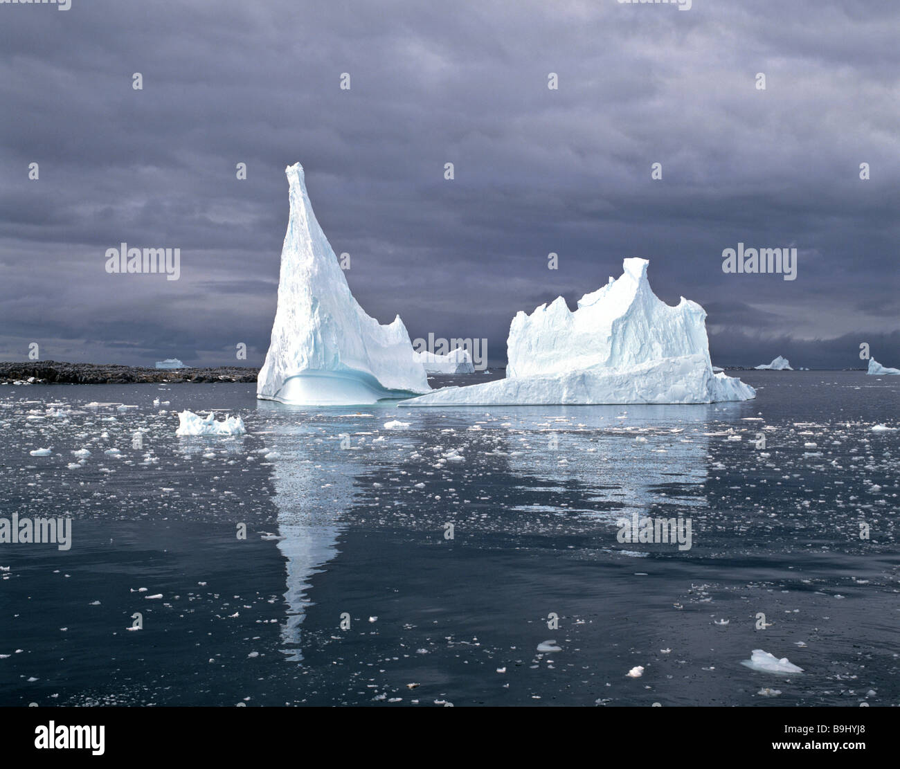 Pointy iceberg floating in the polar sea, ice tower, Antarctic Stock ...
