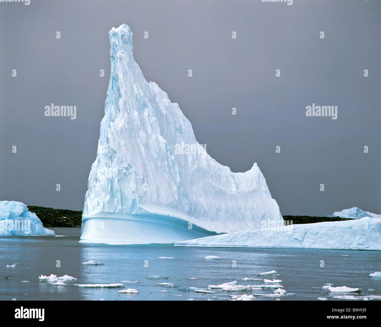 Pointy iceberg floating in the polar sea, ice tower, Antarctic Stock ...