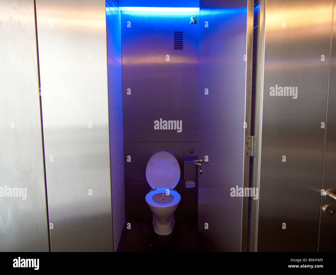 toilet with anti drug UV lighting Stock Photo - Alamy