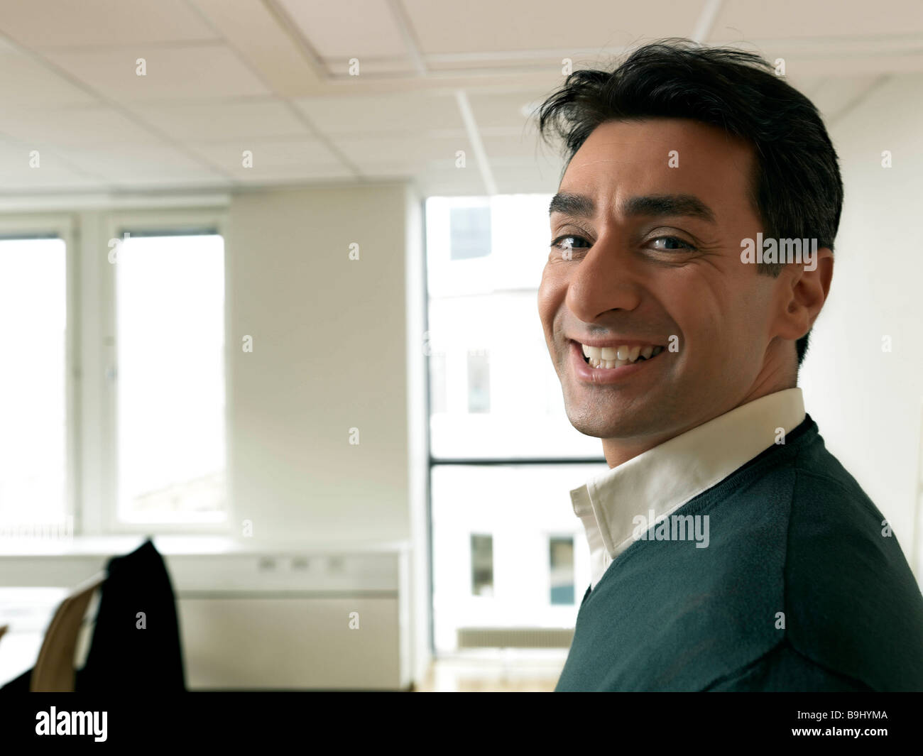 Business man smiling Stock Photo - Alamy
