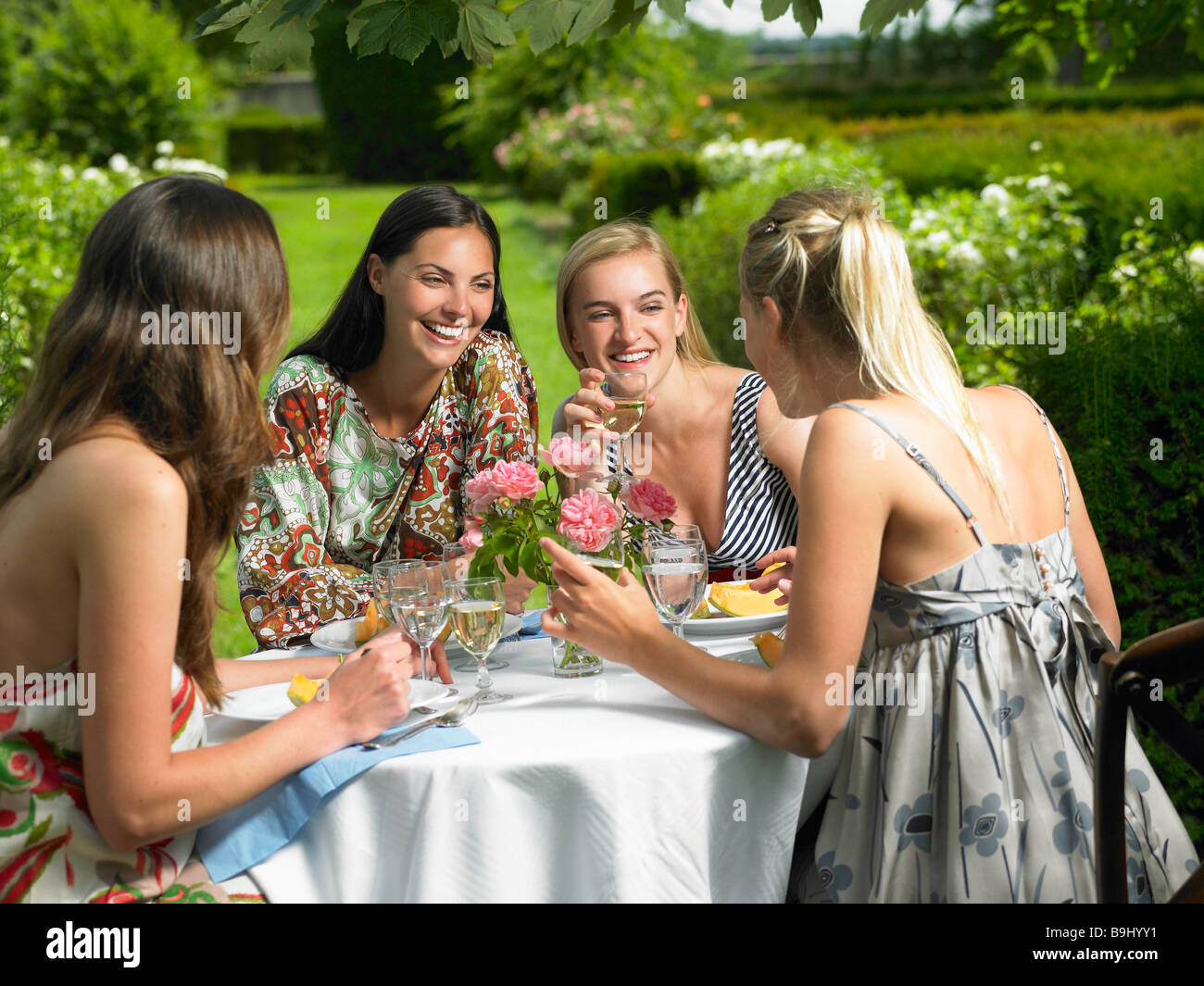 Woman white wine drink outside france hi-res stock photography and ...
