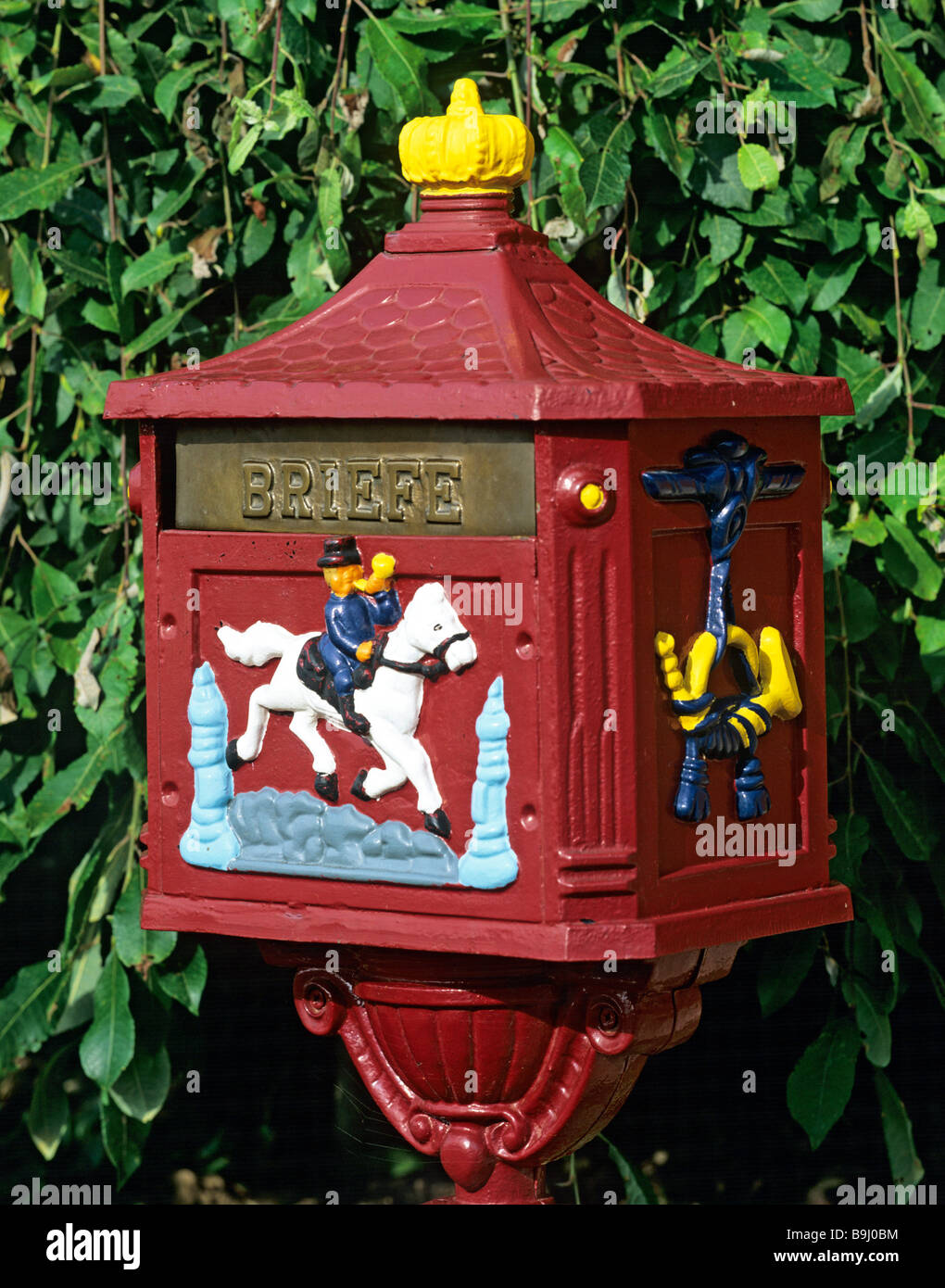 Red decorated letter box, Germany Stock Photo - Alamy