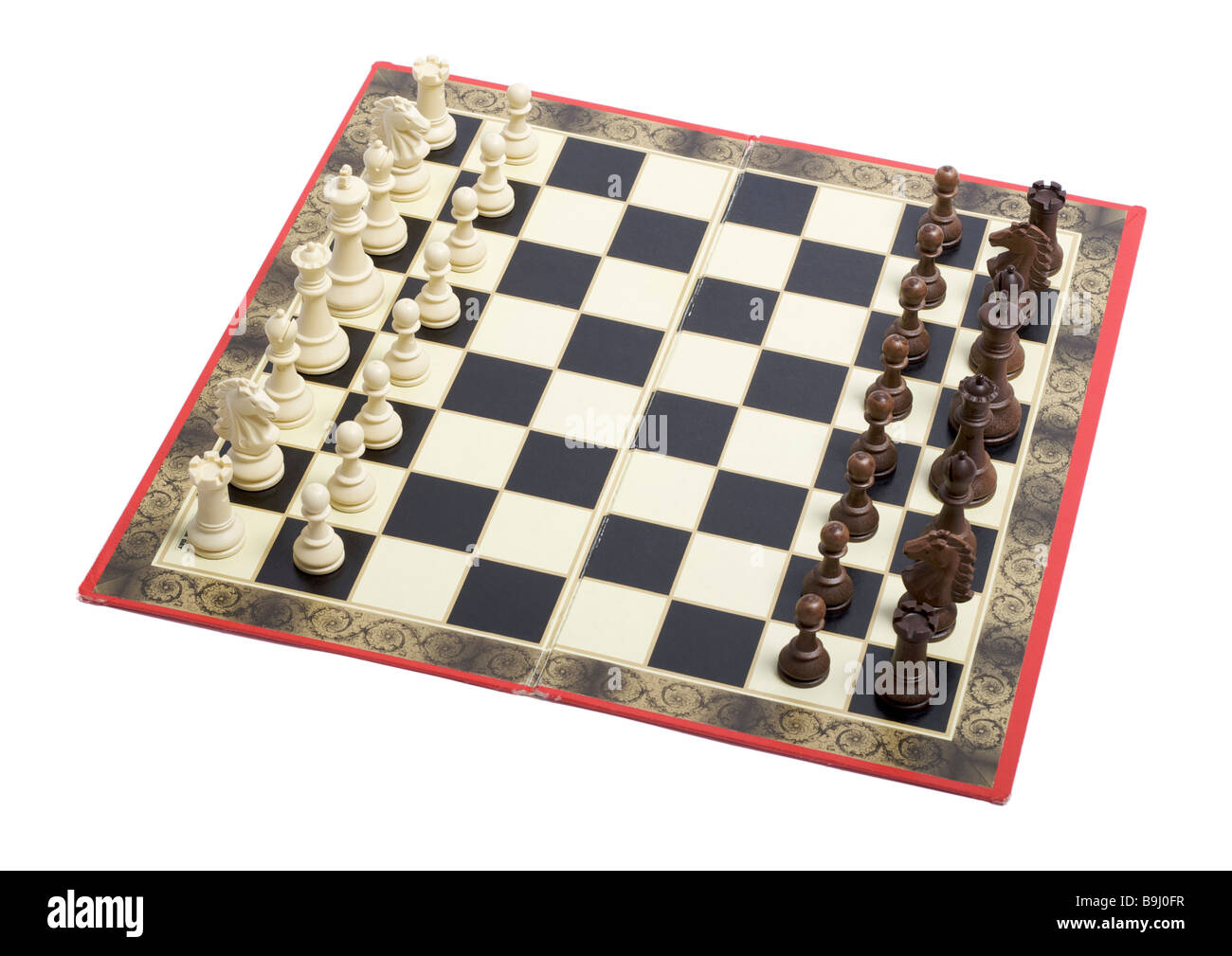 Old chess set on white background Stock Photo - Alamy