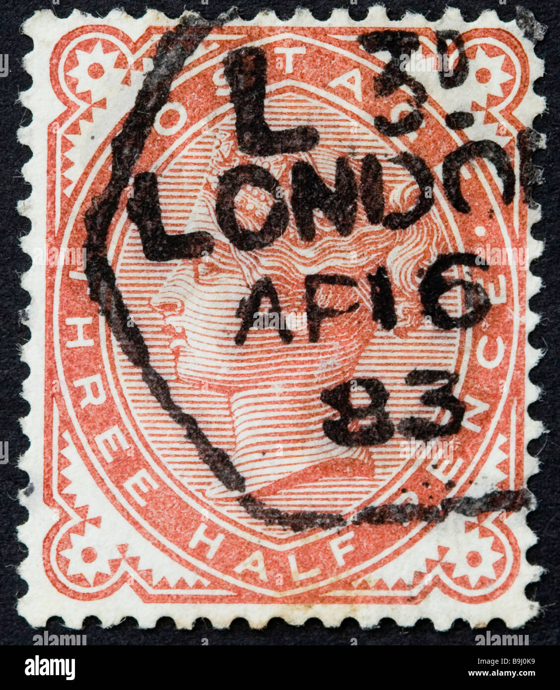 Close up of three halfpenny orange Victorian British Postal stamp on ...