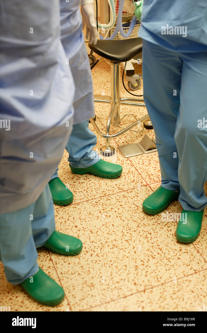 Scrubs in the operating room, detail legs Stock Photo - Alamy