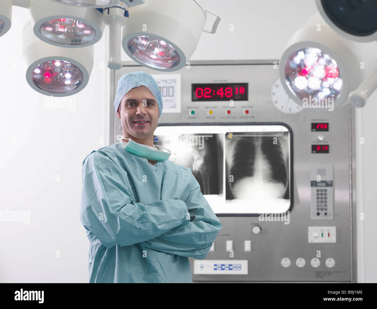 Doctor examining x rays in hi-res stock photography and images - Alamy