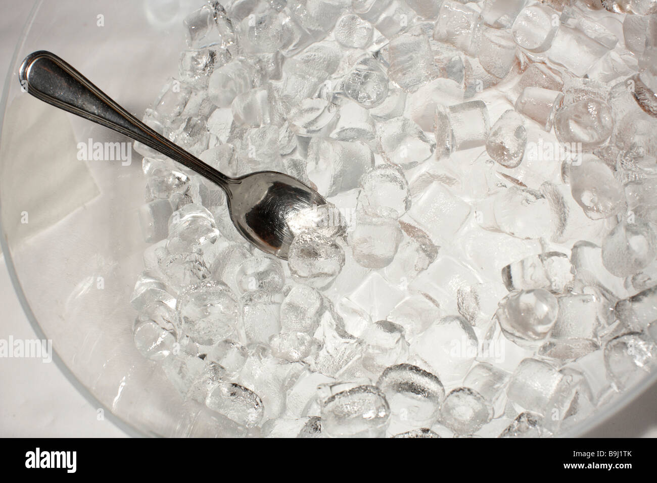 Dish full of ice-cubes Stock Photo - Alamy