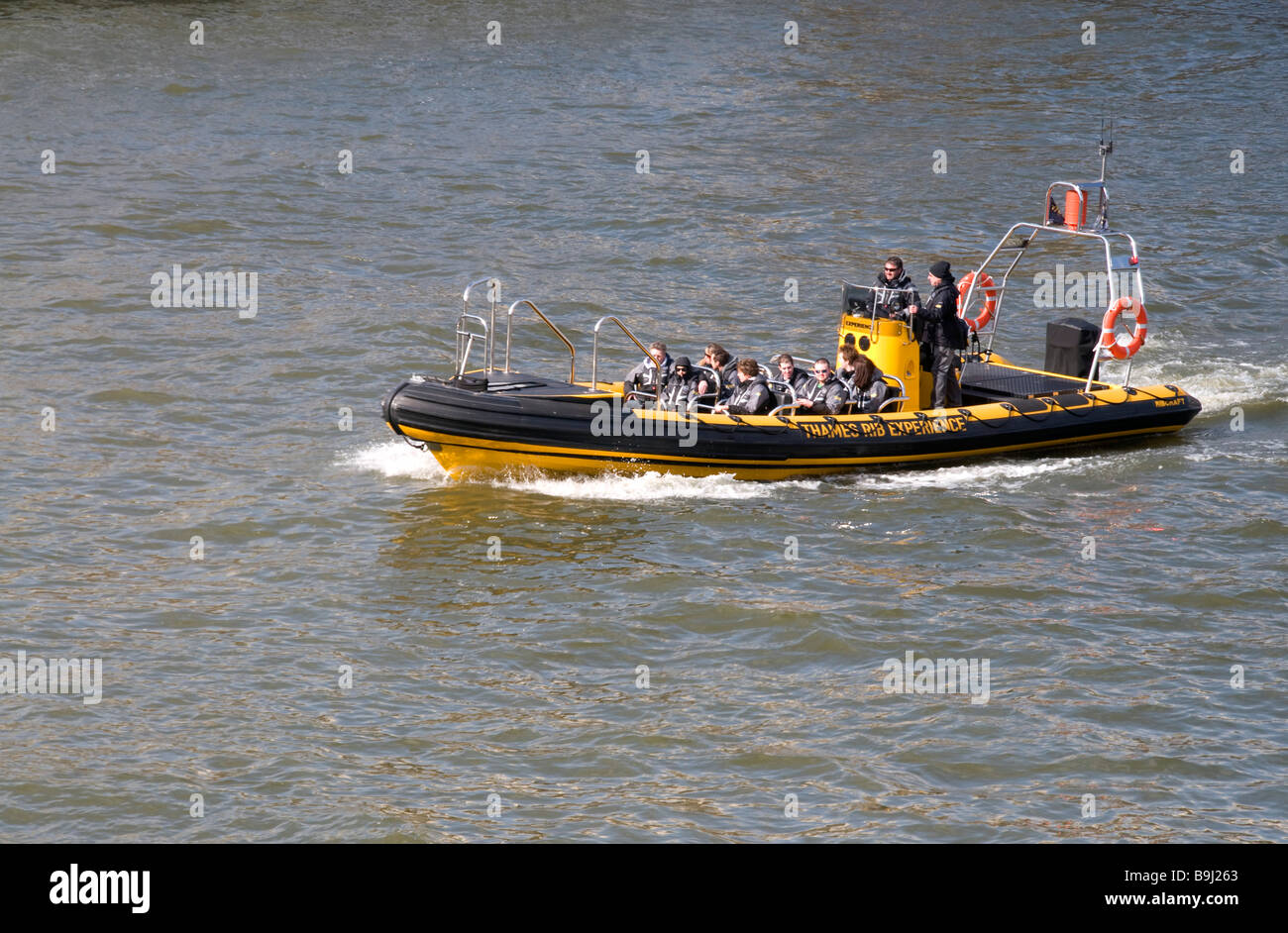 Tourists enjoying a speedboat ride on river Thames in London Stock ...