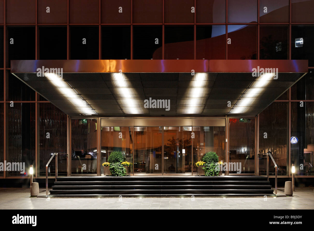 Entrance to the Dreischeibenhaus, Thyssen multistory building, night ...