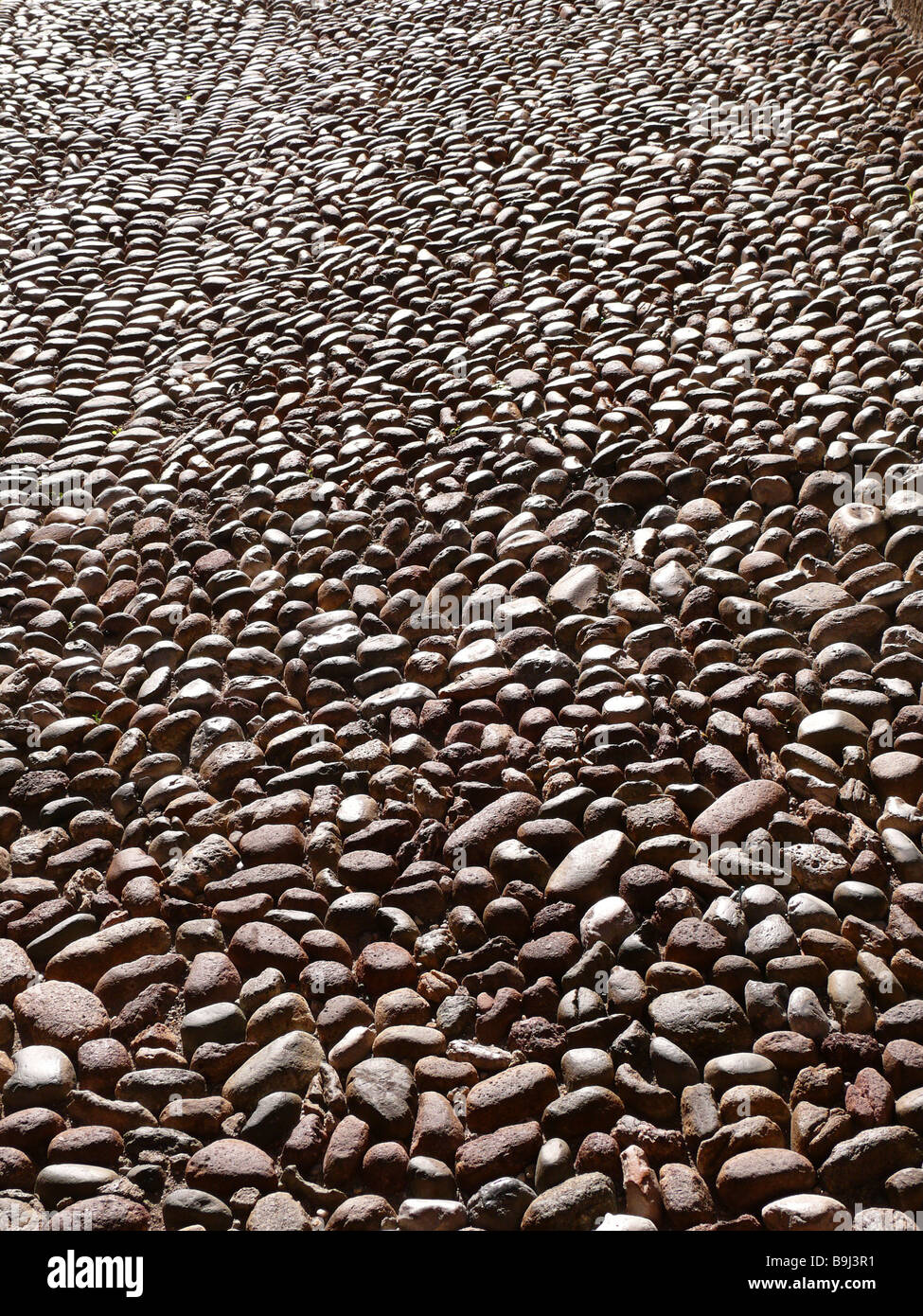 Cobblestones detail back light street way road surface stones ...