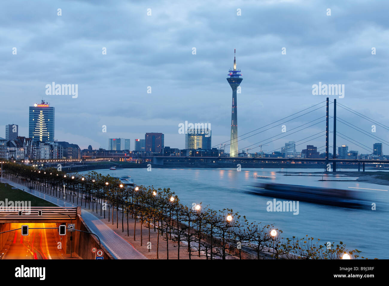 Cityscape of Duesseldorf, view of Rhine promenade, dusk, North Rhine ...