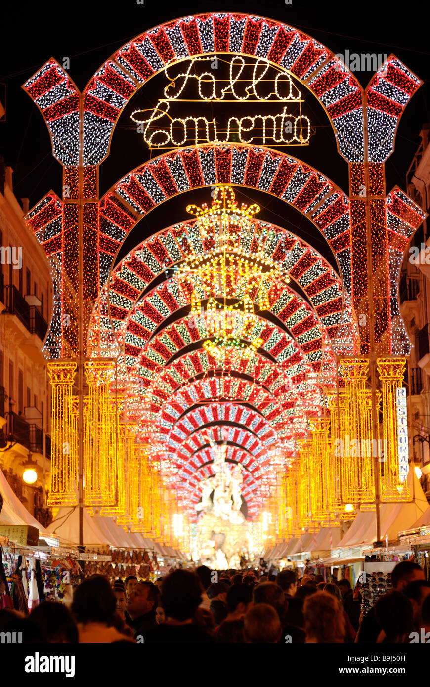 Old fashioned neon street decorations. Las Fallas festival in the city ...
