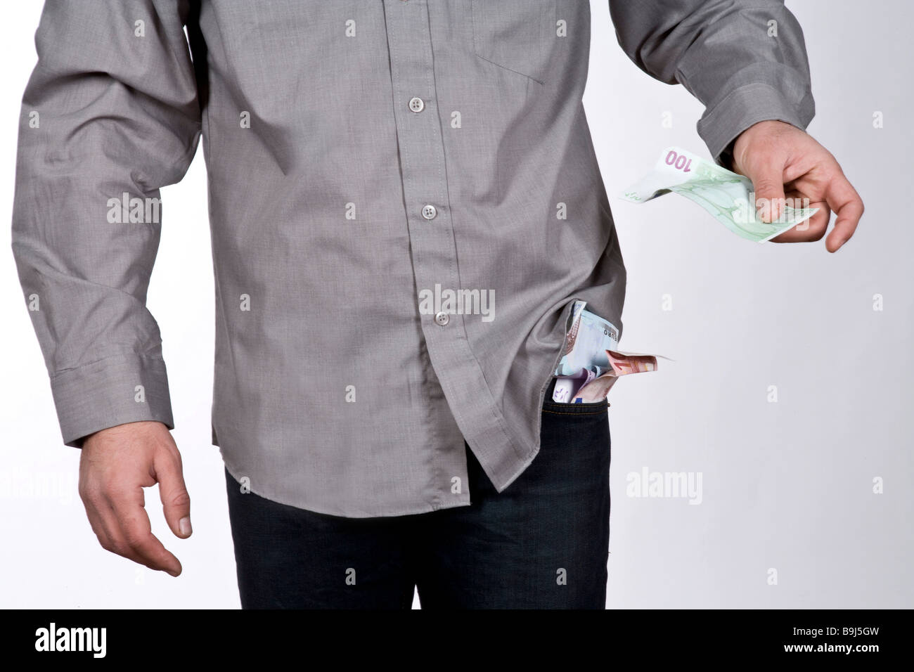 Money sticking out of trouser pocket hi-res stock photography and ...