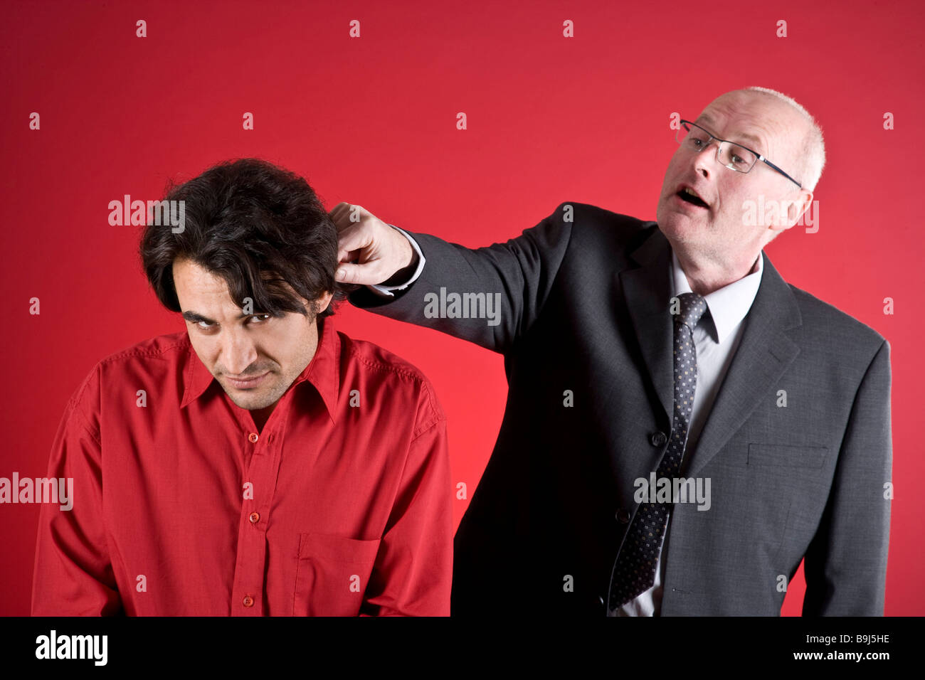 Ear pull hi-res stock photography and images - Alamy