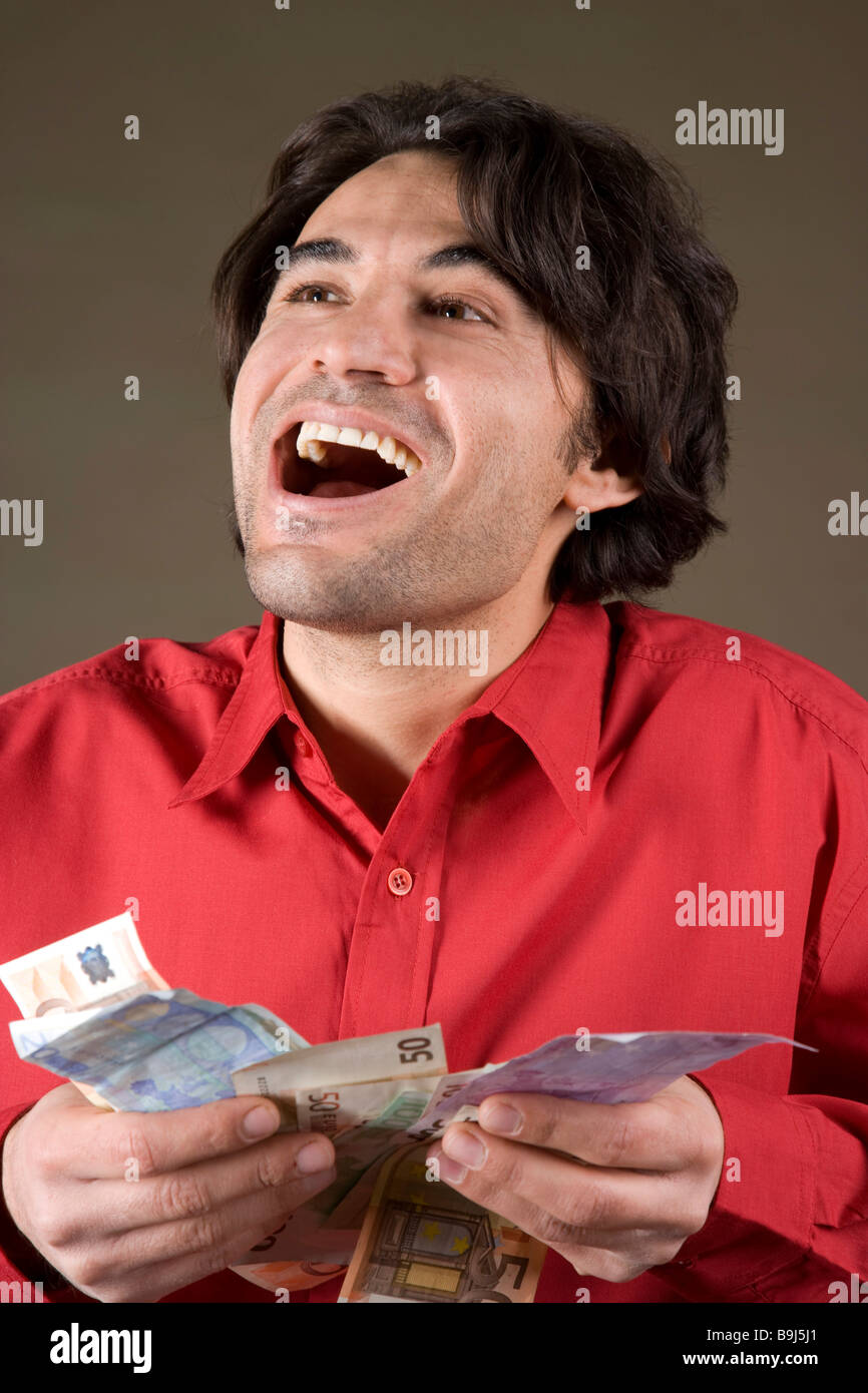 Man euros many banknotes hi-res stock photography and images - Alamy
