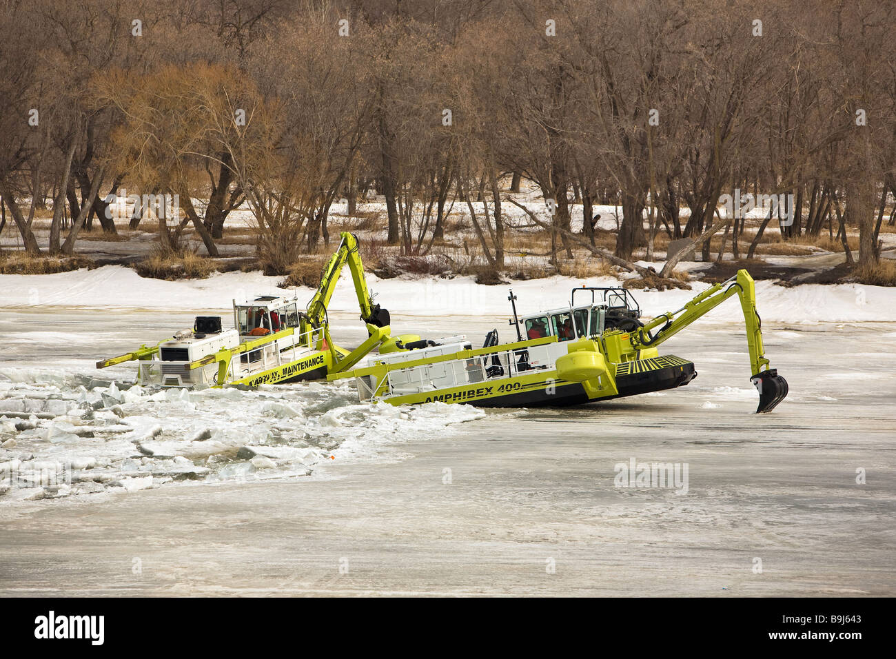 Amphibex Icebreaker machine breaking up ice jams on the Red River, near ...