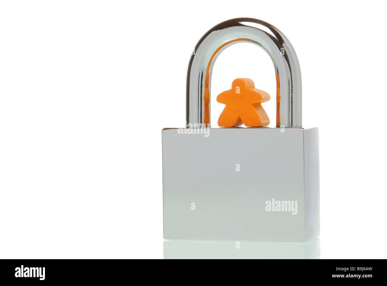 Small human figure on a padlock, symbolic image for personal security ...