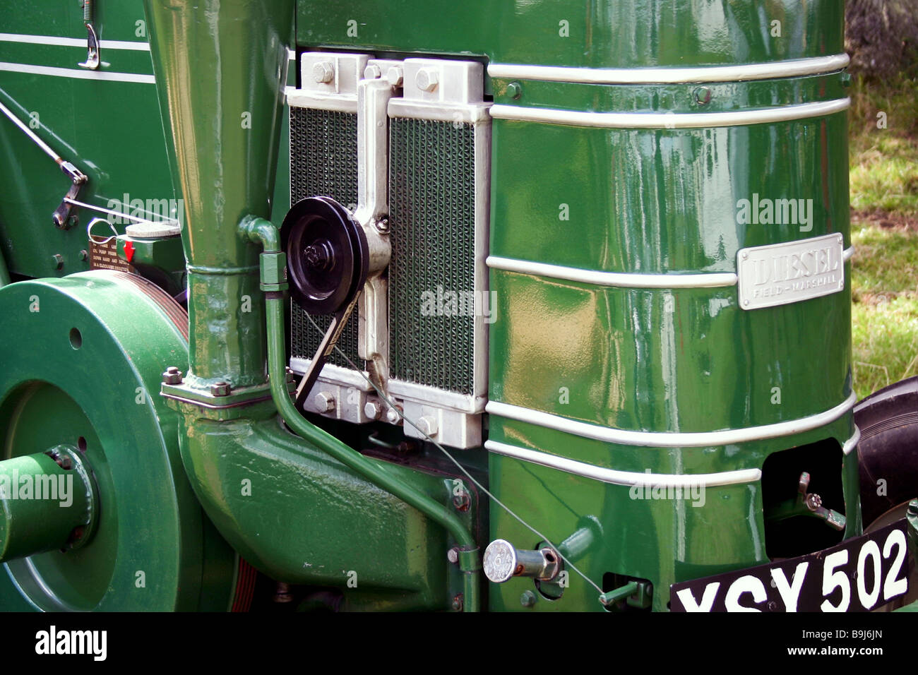 Field Marshall diesel engine powering a log splitting circular saw ...